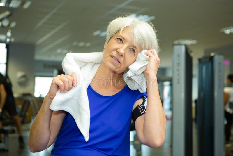 Senior Female Using Towel after Fitness Training Stock Photo - Image of ...