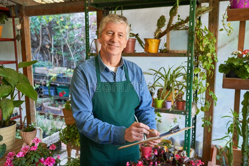 Senior Florist in Flower Shop Doing Inventory Stock Photo - Image of ...