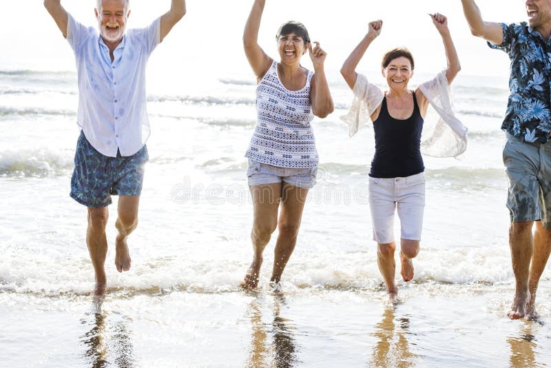 Senior Friends Having Fun at the Beach Stock Image - Image of senior ...