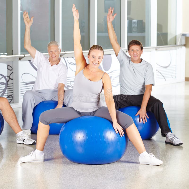Senior Group Doing Back Training Exercises in Gym Stock Photo - Image ...