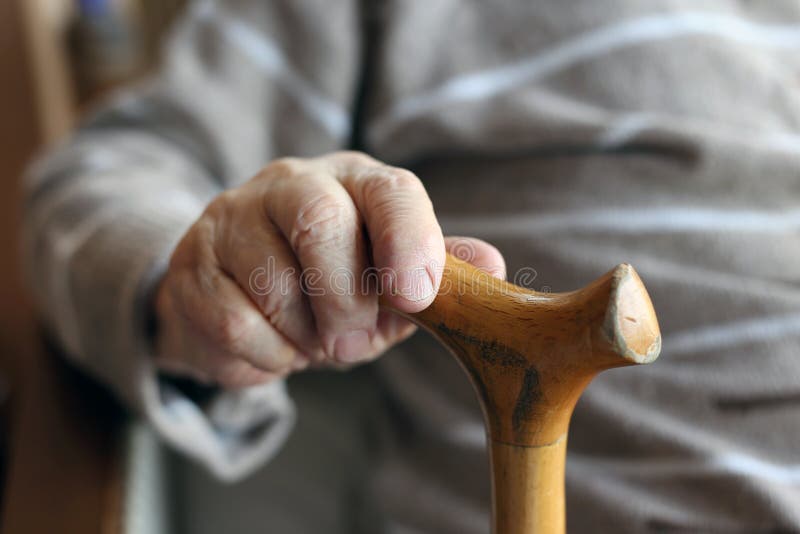 Senior hand holding cane stock photo. Image of hand, finger - 29460778