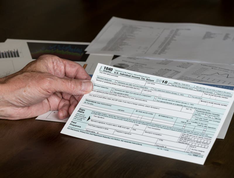 Form 1040 Simplified Allows Filing of Taxes on Postcard Editorial Photo ... Form 1040 Simplified Allows Filing of Taxes on Postcard Editorial Photo ...