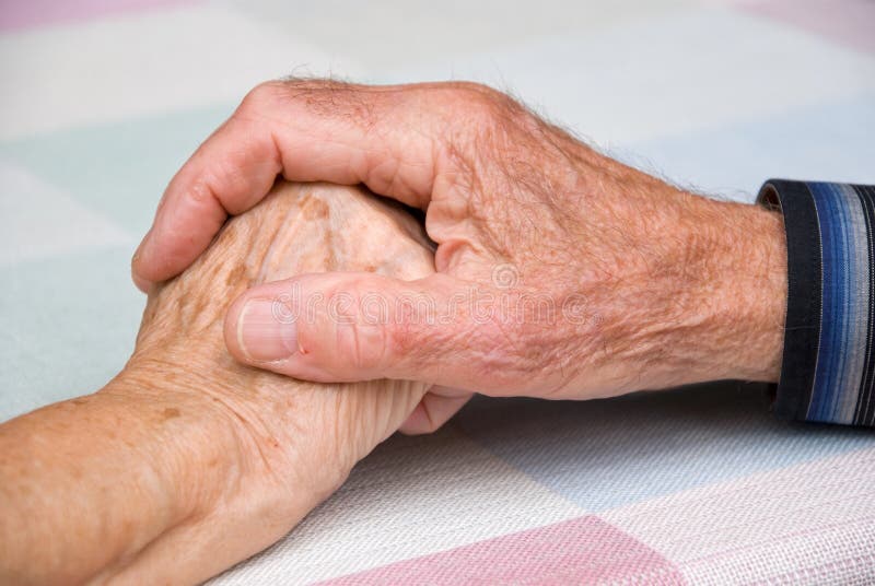 Two Senior Citizens Holding Hands Stock Photo - Image of hands ...