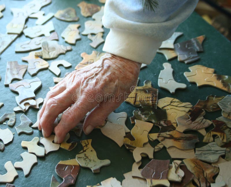 Senior Hands Buidling Puzzle Stock Photo - Image of wrinkles, lady ...
