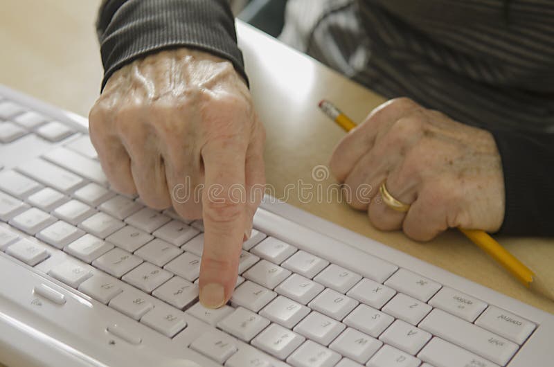 Senior hands on keyboard editorial stock photo. Image of white - 39094928