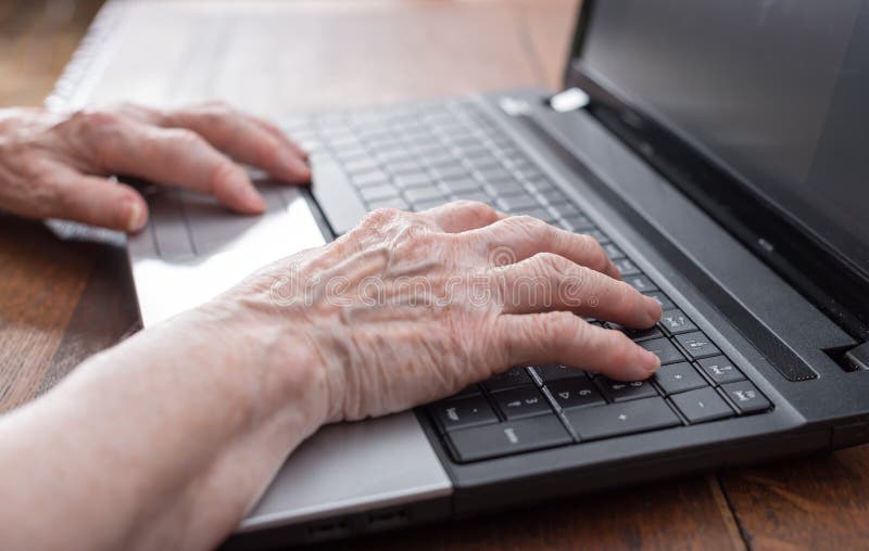 Older Woman Typing On Laptop Keyboard Stock Image - Image of casual ...