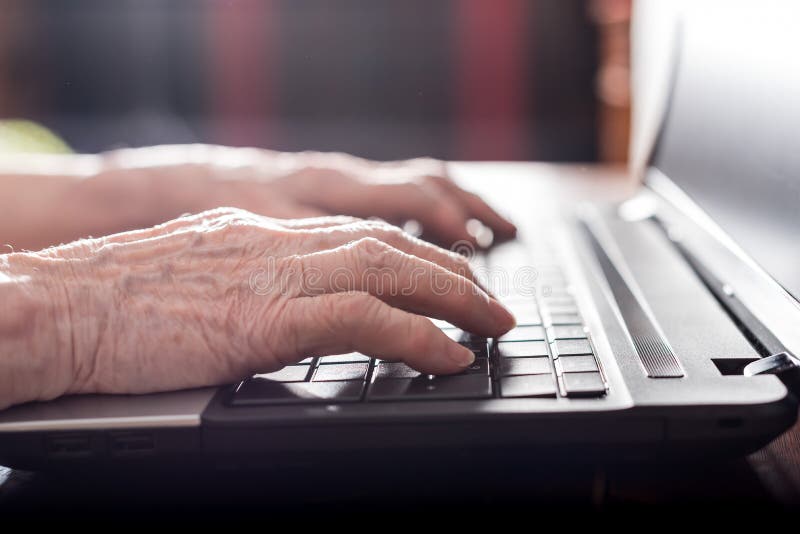 Senior Hands Typing on a Laptop Keyboard Stock Image - Image of hands ...