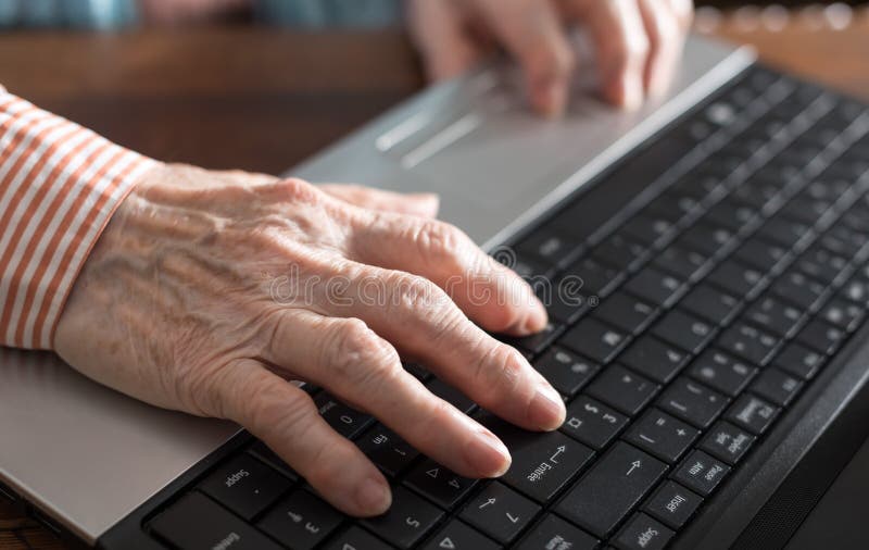 Senior Hands Typing on a Laptop Keyboard Stock Photo - Image of hand ...