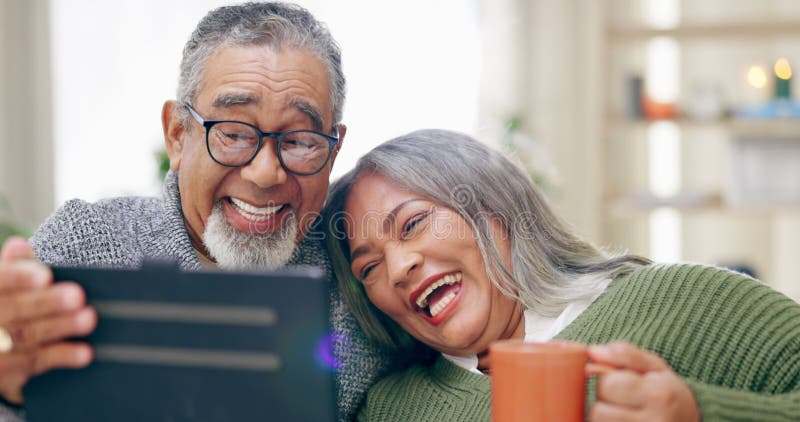 Senior Happy Couple Tablet And Couch In Home For Video Meme Or Social