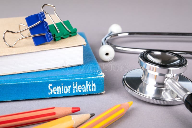 Senior Health Concept. Blue Book on a Gray Office Table Stock Photo ...