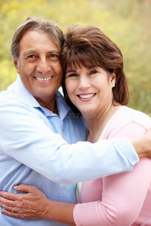 Senior Hispanic Couple Outdoors Stock Photo - Image of loving, enjoying ...