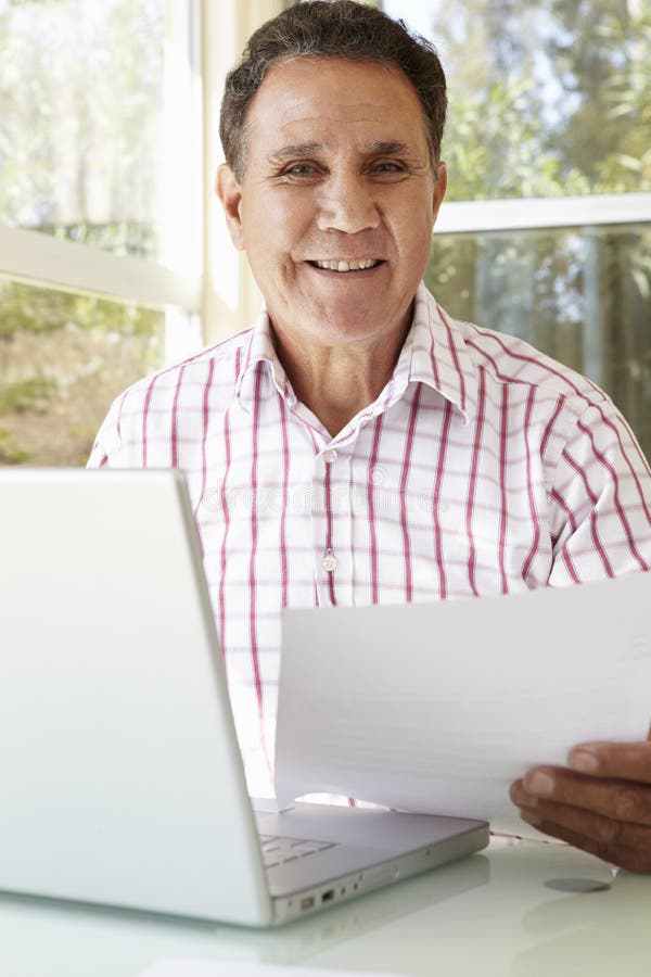 Senior Hispanic Man Working in Home Office Stock Image - Image of ...