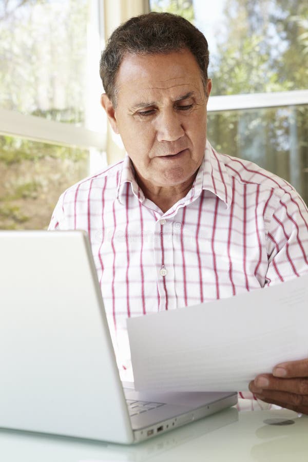 Senior Hispanic Man Working in Home Office Stock Photo - Image of ...