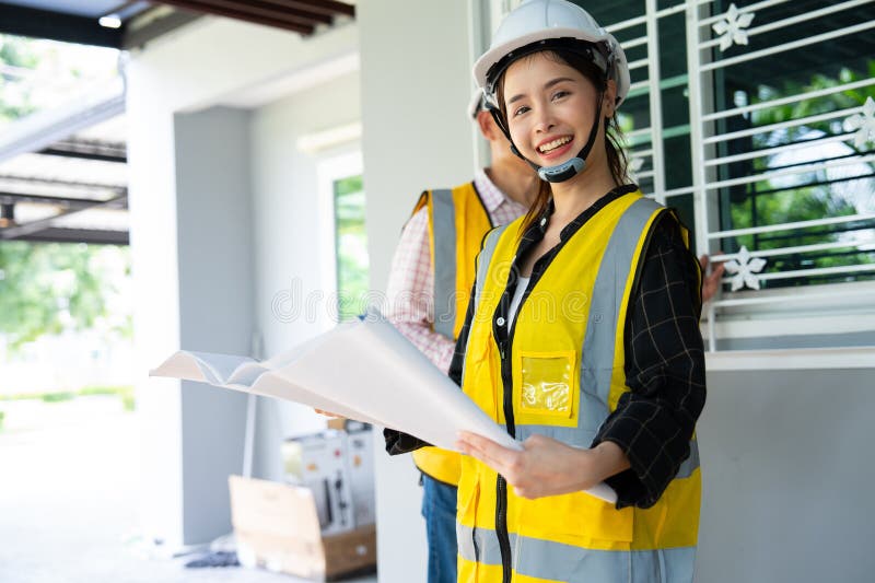 Senior Home Inspector Checking Home Defects and Teaching Young Engineers, before Handing it Over ...