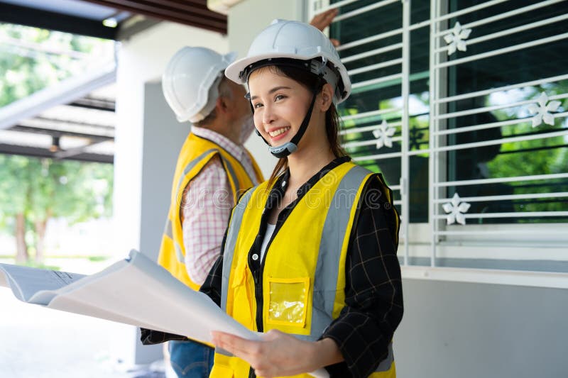 Senior Home Inspector Checking Home Defects and Teaching Young ...