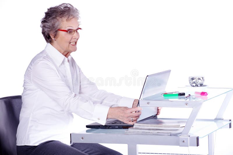 Senior lady on computer stock photo. Image of attractive - 40601898