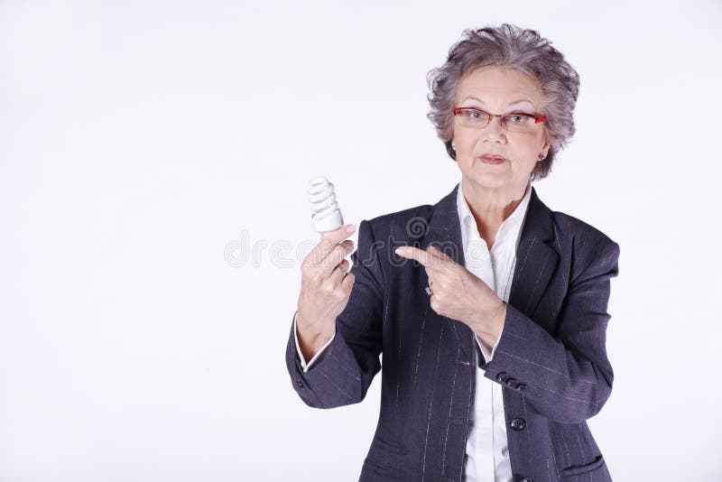 Senior Lady with Light Bulb Stock Photo - Image of fifties, electric ...
