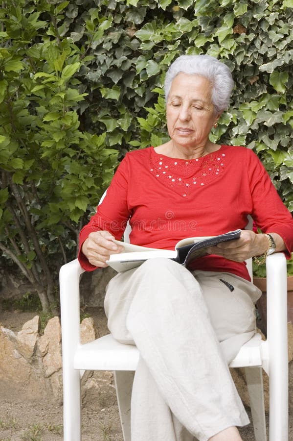 Senior lady reading stock image. Image of woman, read - 2369127