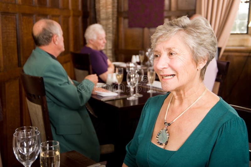 Senior lady in restaurant stock photo. Image of grandparents - 12060084