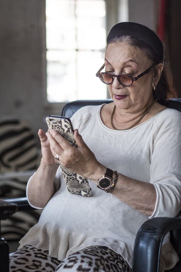 Senior Lady Using Her Smart Phone Stock Photo - Image of mobile, style ...