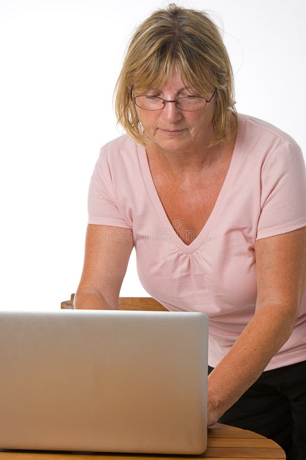 Senior Lady Using Laptop stock image. Image of mature - 5864899