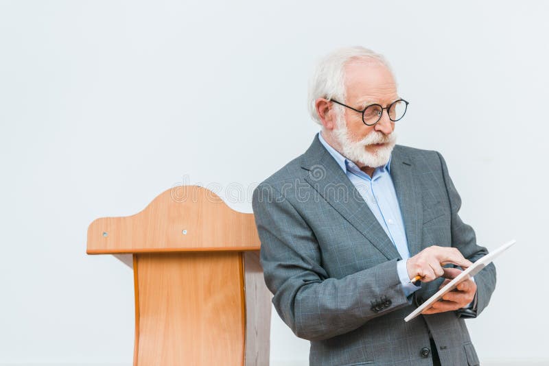 Senior Lecturer Using Tablet Isolated Stock Image - Image of handsome ...