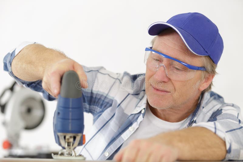 Carpenter Working on Wood Structure on Residential Construction Stock ...