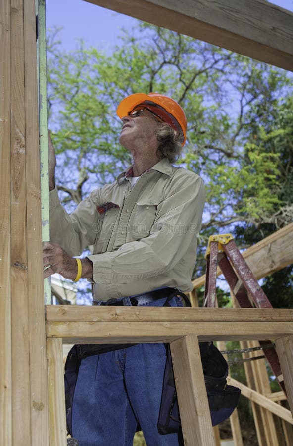Senior Male Construction Worker Stock Photo - Image of level, framing ...