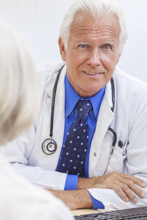 Senior Male Doctor with Female Patient Stock Image - Image of medicine ...