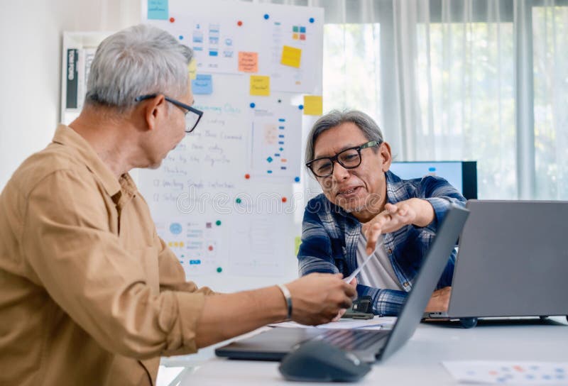 Senior Male Participating in a Computer Programming Bootcamp, Improving ...