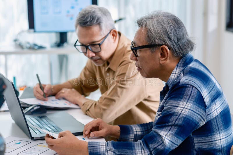 Senior Male Participating in a Computer Programming Bootcamp, Improving ...