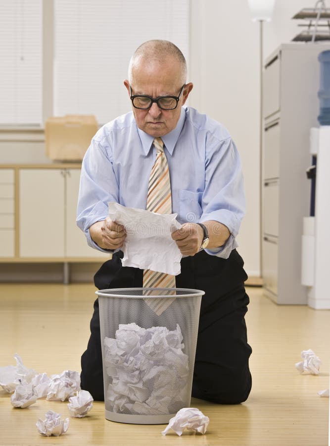 Senior Male Reading Paper at Garbage. Stock Photo - Image of kneeling ...