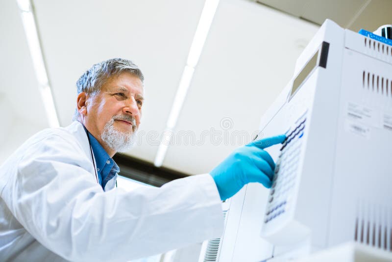 Senior Male Researcher in a Lab Stock Photo - Image of microscope ...