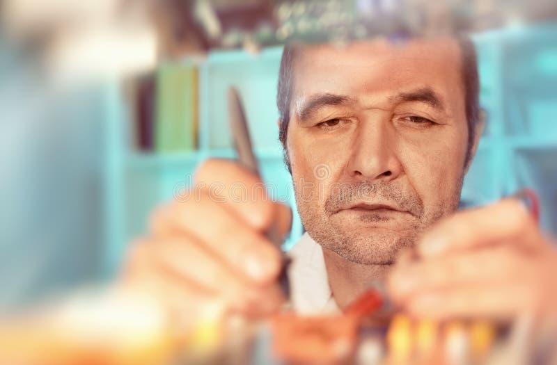 Senior Tech Works in Hartware Repair Facility Stock Image - Image of ...