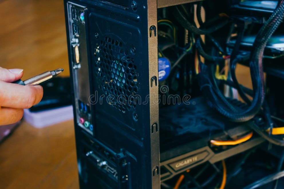 Senior Male Tech Works in Hardware Repair Facility.guy is Assembling a ...