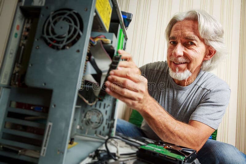 Senior Man Assembling Computer Stock Image - Image of computer, indoors ...