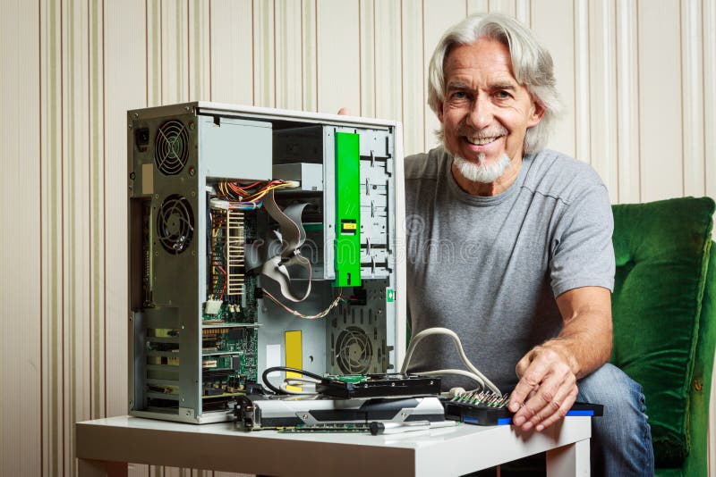 Senior Man Assembling a Desktop Computer Stock Photo - Image of ...