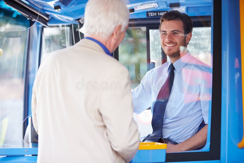 Senior Man Boarding Bus and Buying Ticket Stock Photo - Image of ...