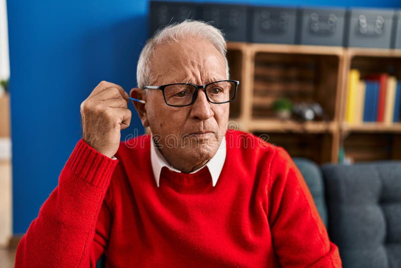 Senior Man Cleaning Ear at Home Stock Photo - Image of cozy, comfort ...