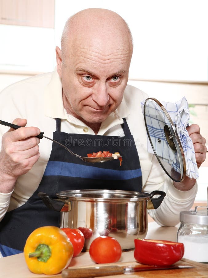 Senior man cooking stock image. Image of pepper, table - 13620695
