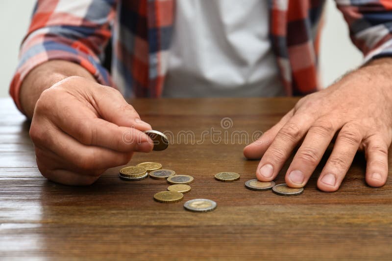 Senior Man Counting Coins at Table Stock Image - Image of change ...