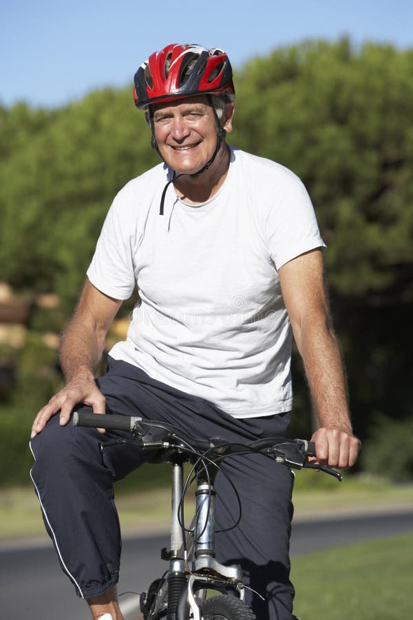 Senior Man on Cycle Ride stock image. Image of vertica - 55890747
