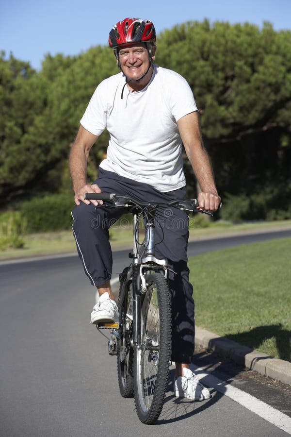 Senior Man on Cycle Ride stock image. Image of enjoying - 54940525
