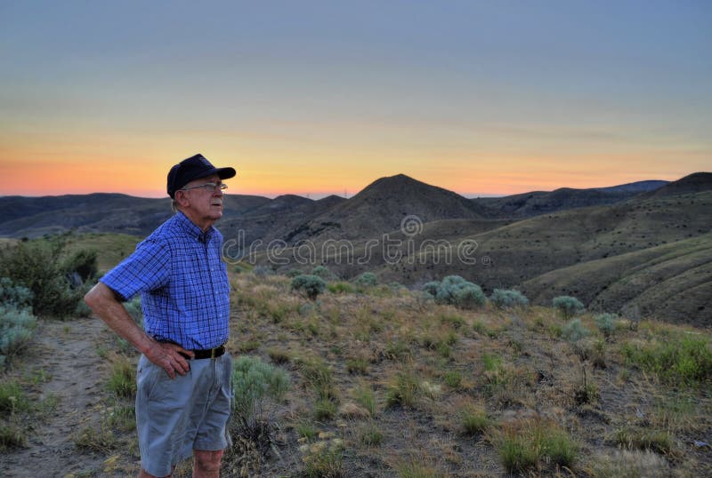 Senior man, desert sunset stock photo. Image of road, years - 7331744