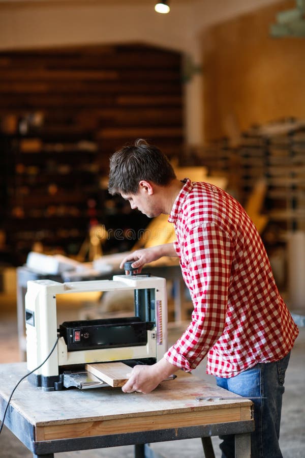 Senior Man Doing Carpentry with Edging Plane on Workbench Stock Image ...