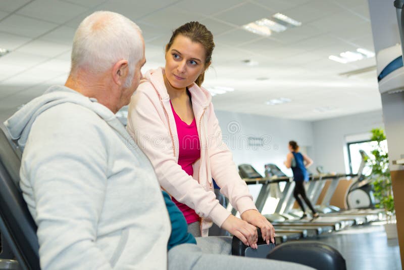 Senior Man Doing Sport Exercises with Personal Trainer Stock Photo ...