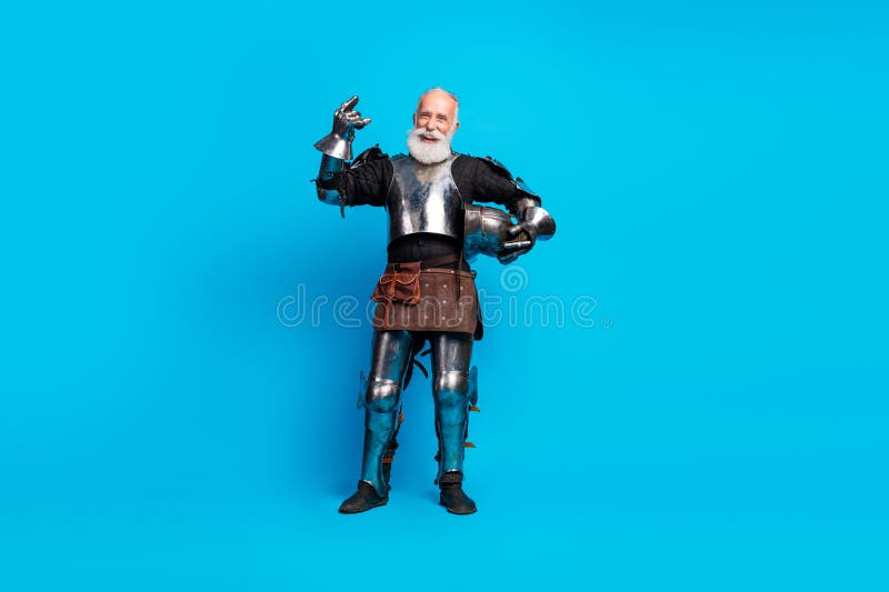 Elderly Man in Full Knight Armor Striking a Noble Pose Against a ...