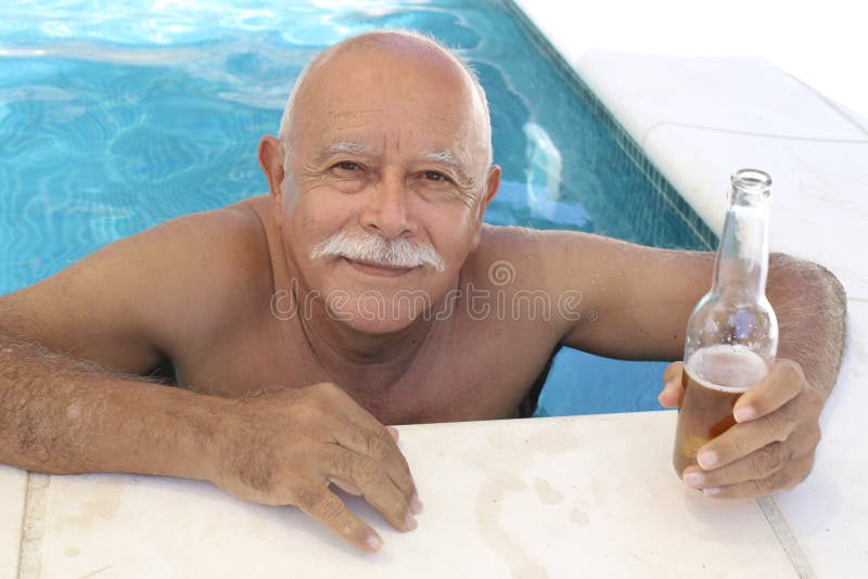 Senior Man Drinking Beer in Swimming Pool Stock Photo - Image of ...