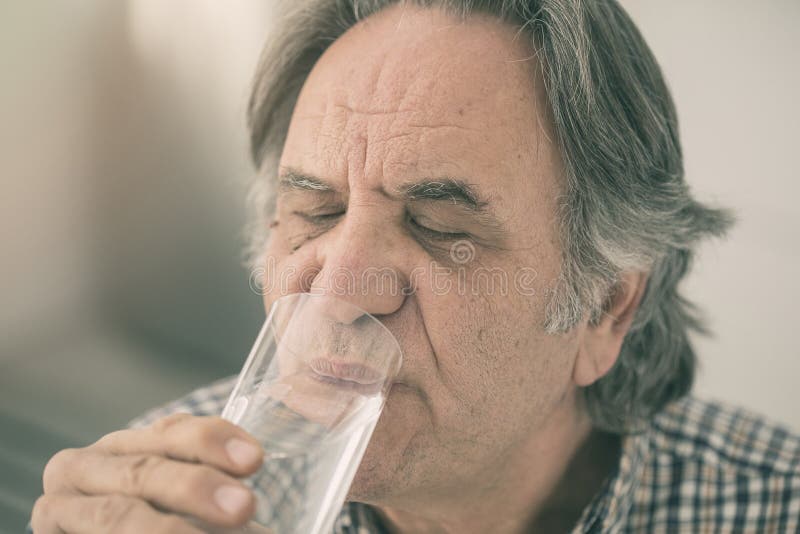 Senior Man Drinking Glass of Water Inside Stock Photo - Image of clean ...