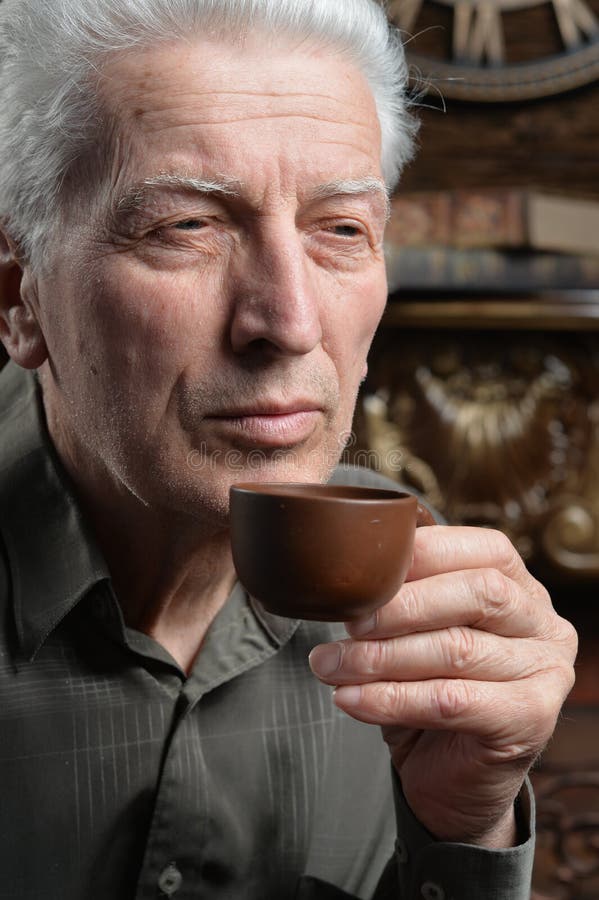Senior man drinking tea stock image. Image of inhappy - 114263997
